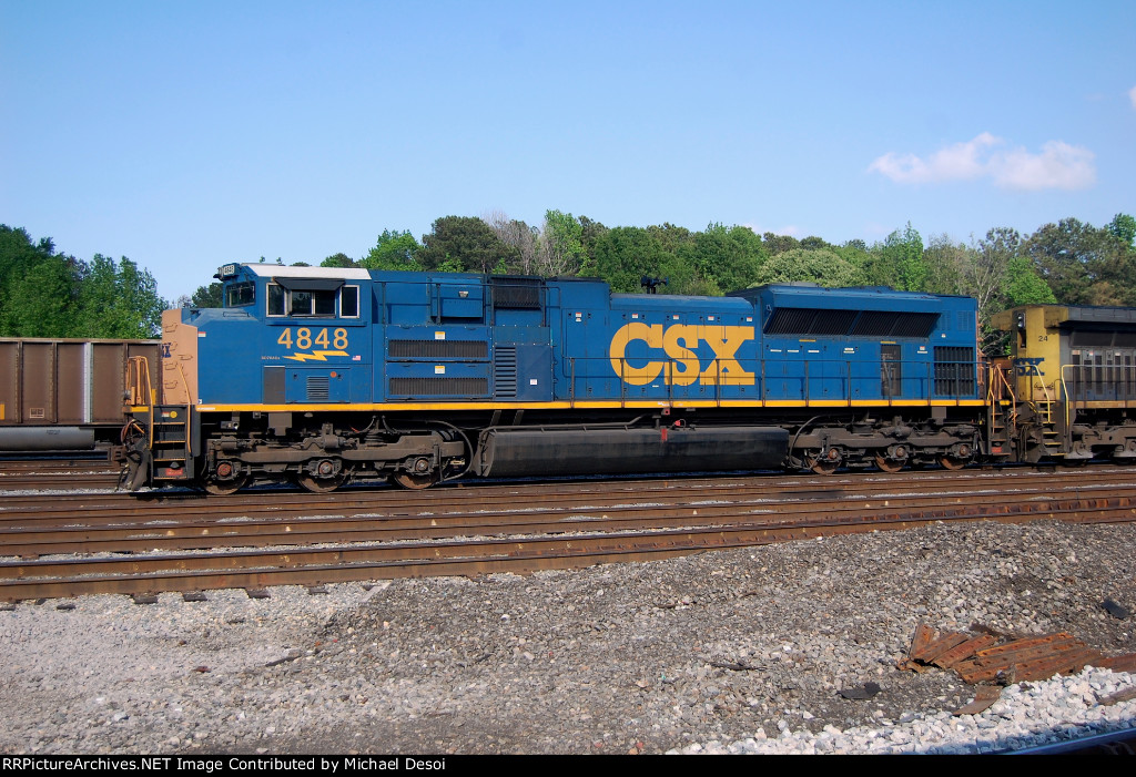 CSX SD-70ACE #4848 sits in the yard next to the passenger station